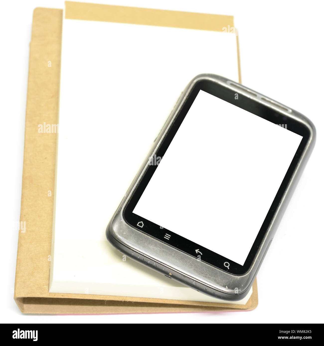 used smartphone with note book on a white background Stock Photo - Alamy