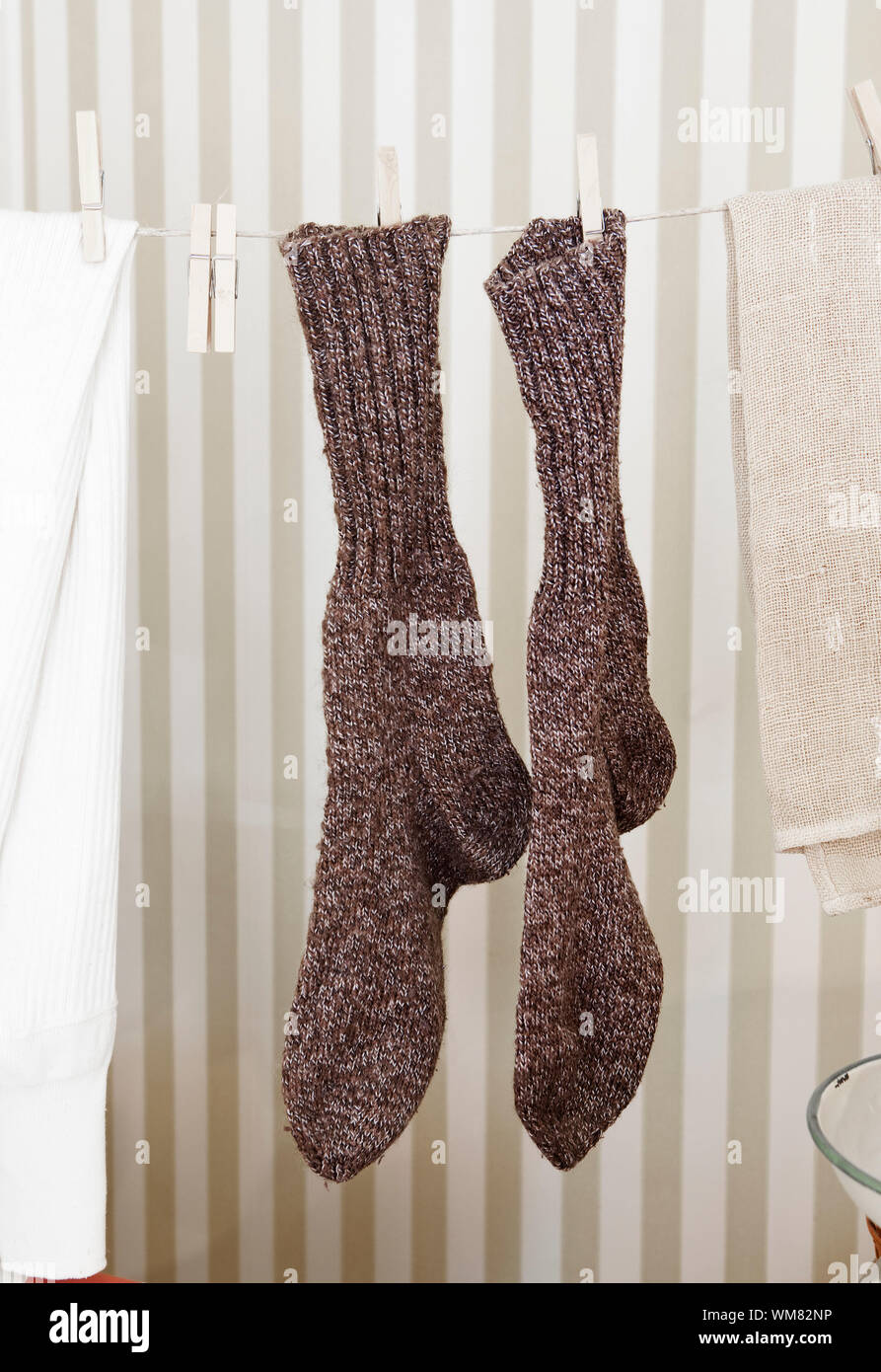 Wool socks drying hi-res stock photography and images - Alamy