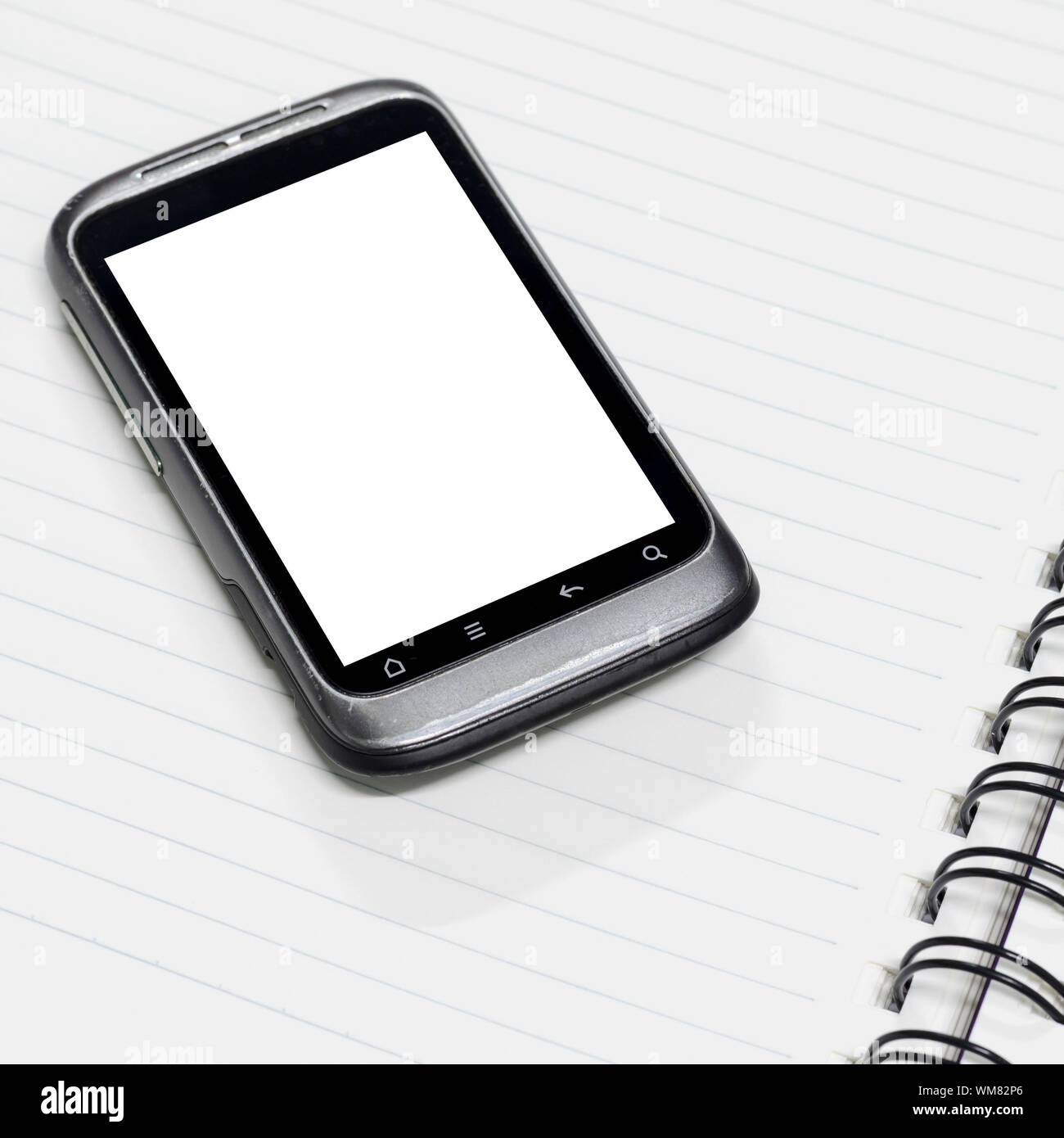 smartphone on note book Stock Photo - Alamy