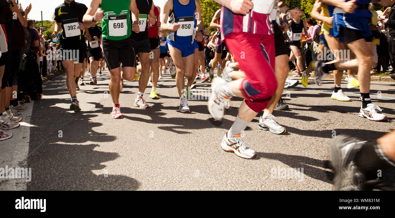 Lots of people running in a sports game Stock Photo - Alamy