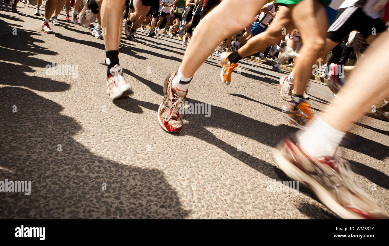 Lots of people running in a sports game Stock Photo - Alamy