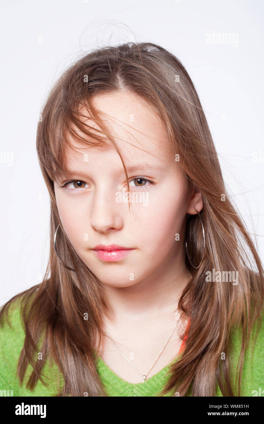 studio portrait of a pretty, eleven years old girl Stock Photo - Alamy