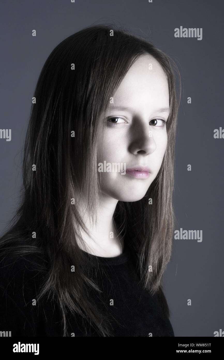 studio portrait of a pretty, eleven years old girl Stock Photo - Alamy