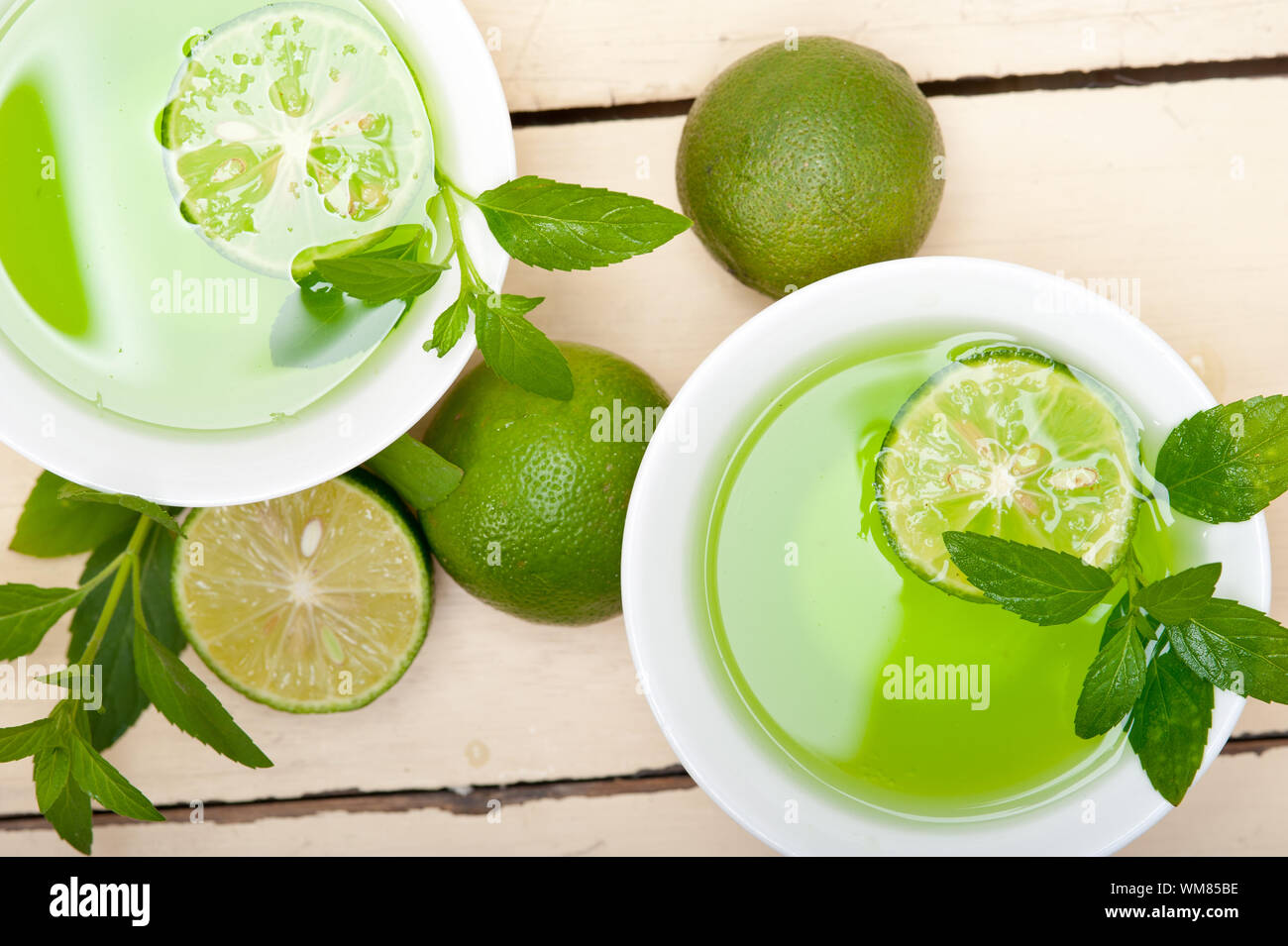 fresh and healthy mint infusion tea tisane with lime Stock Photo - Alamy