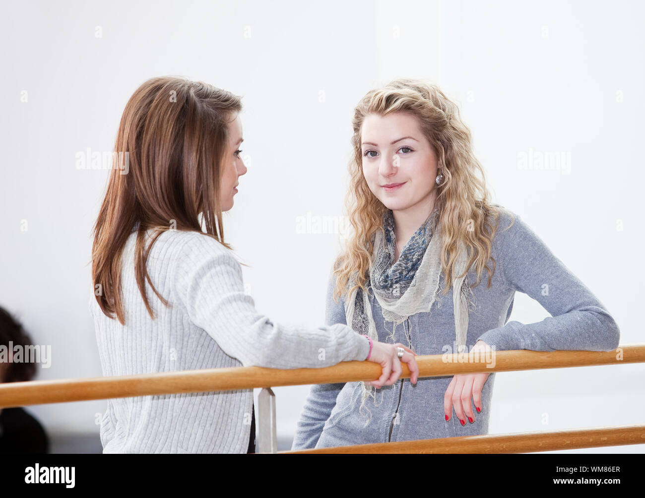two girls in a conversation Stock Photo - Alamy