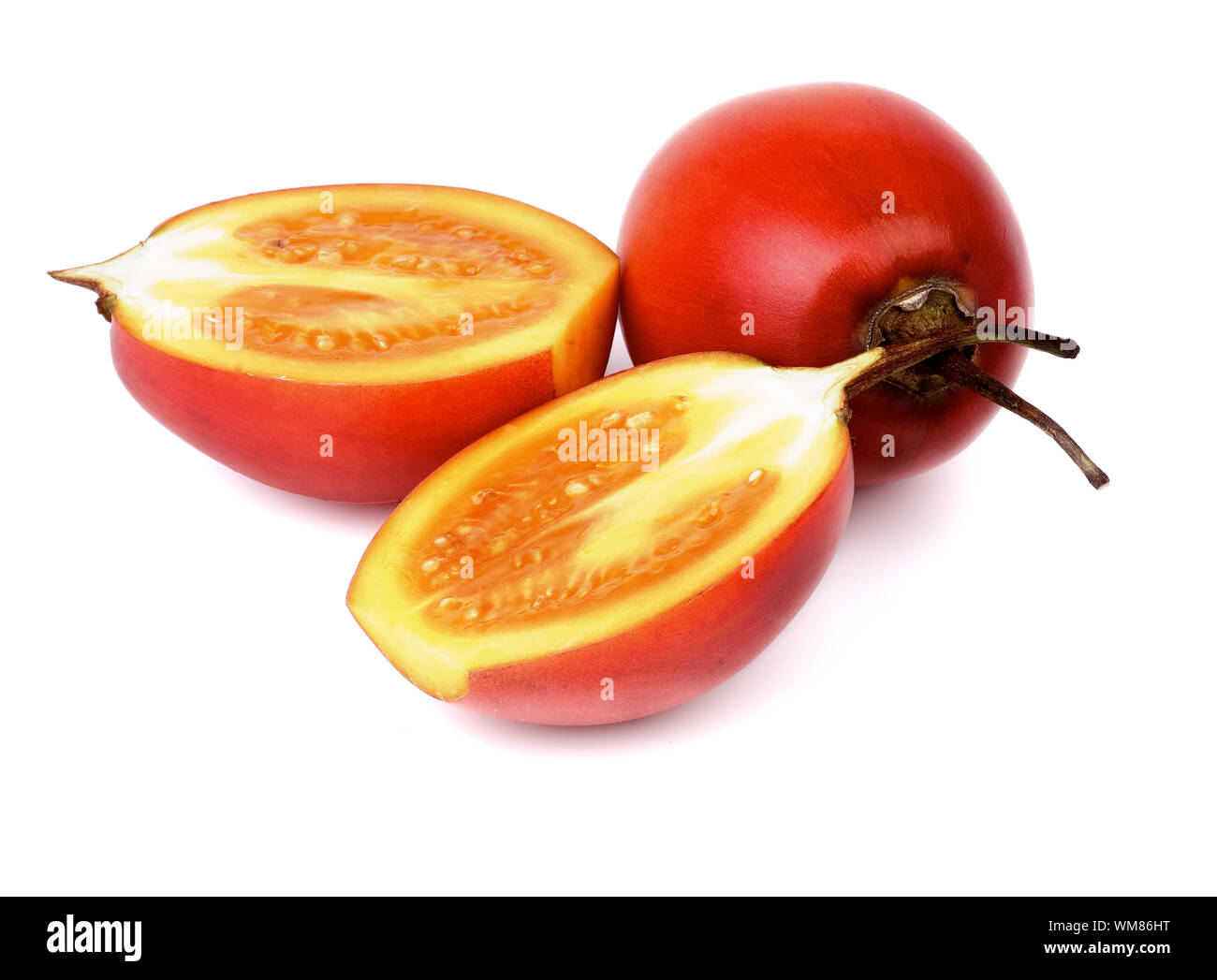 Exotic Tropical Fruits Tamarillo Full Body and Halves isolated on white ...