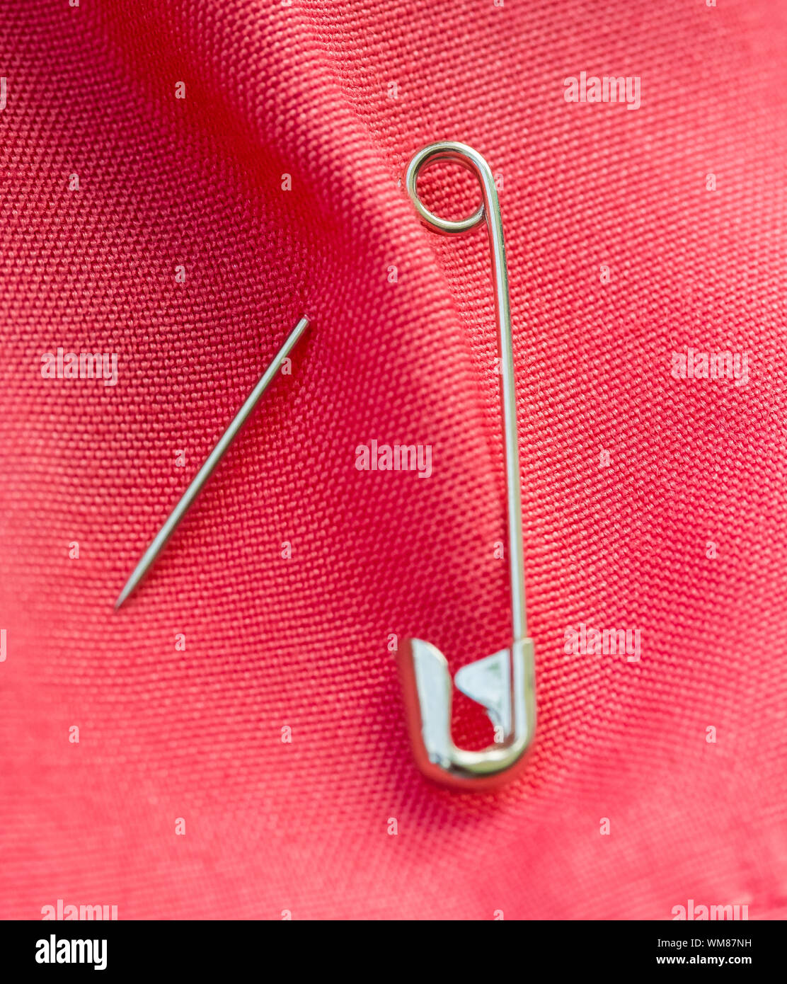 Safety Pin Representing Sewing Needle And Stitch Stock Photo - Alamy
