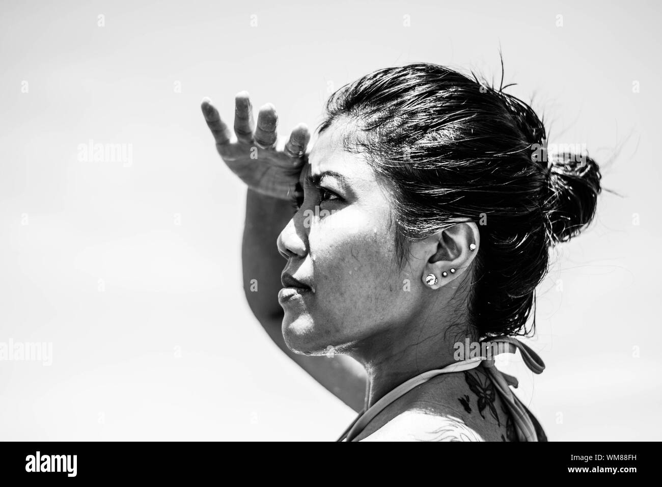 Woman shielding her face hi-res stock photography and images - Alamy