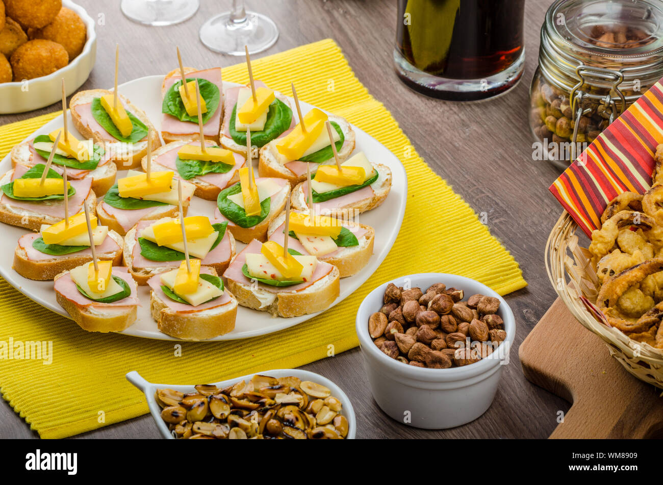 New Year's Eve meal - canapes with ham, cheese and spinach leaves ...