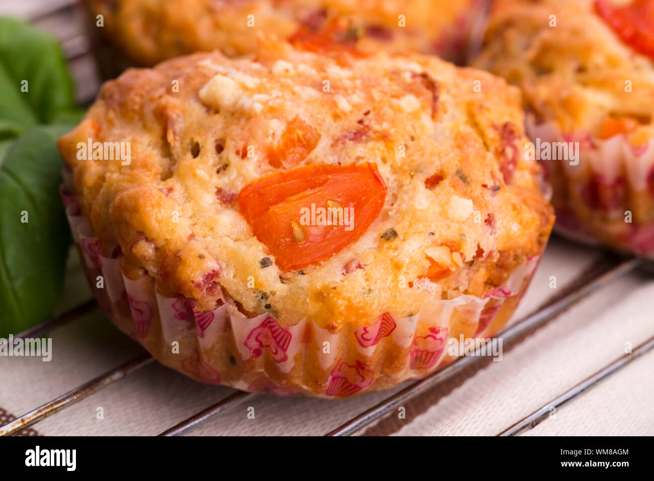 Fresh pizza muffin as a snack Stock Photo - Alamy