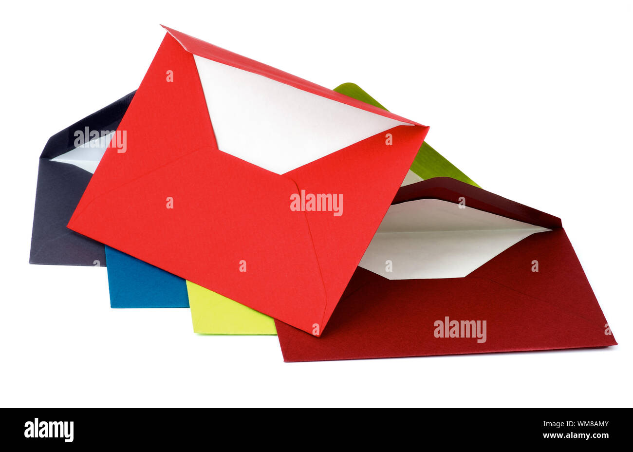 Arrangement of Colored Paper Envelopes isolated on white background ...