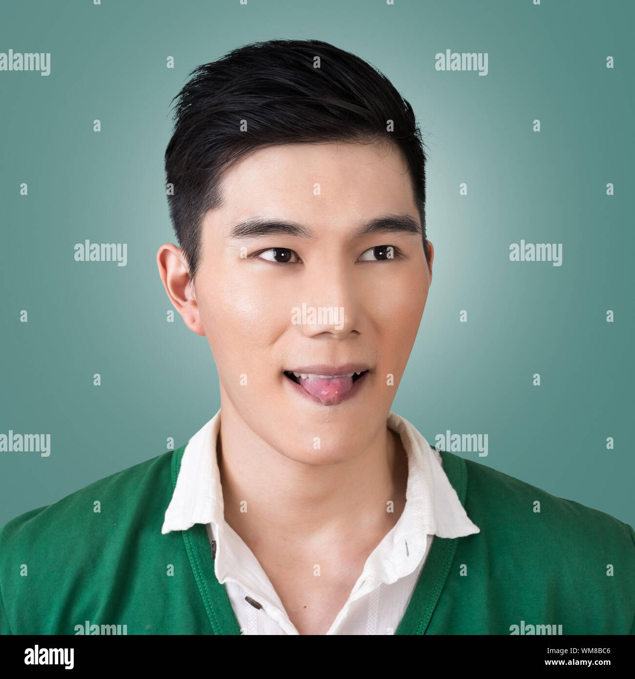 Funny facial expression, closeup Asian young man Stock Photo - Alamy