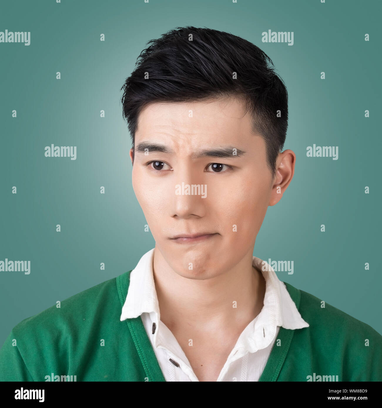 Funny facial expression, closeup Asian young man Stock Photo - Alamy