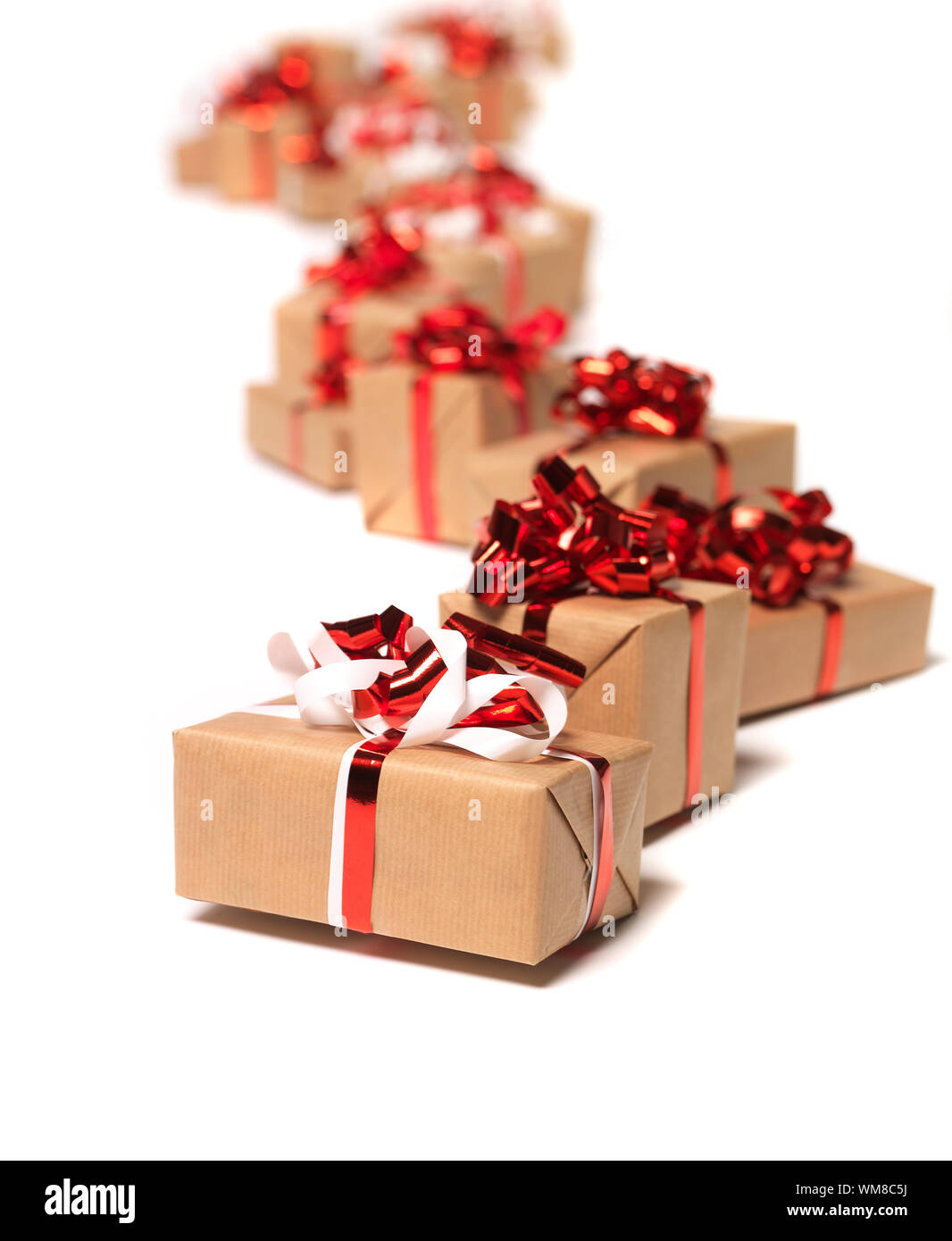 Christmas gifts in a row Stock Photo - Alamy