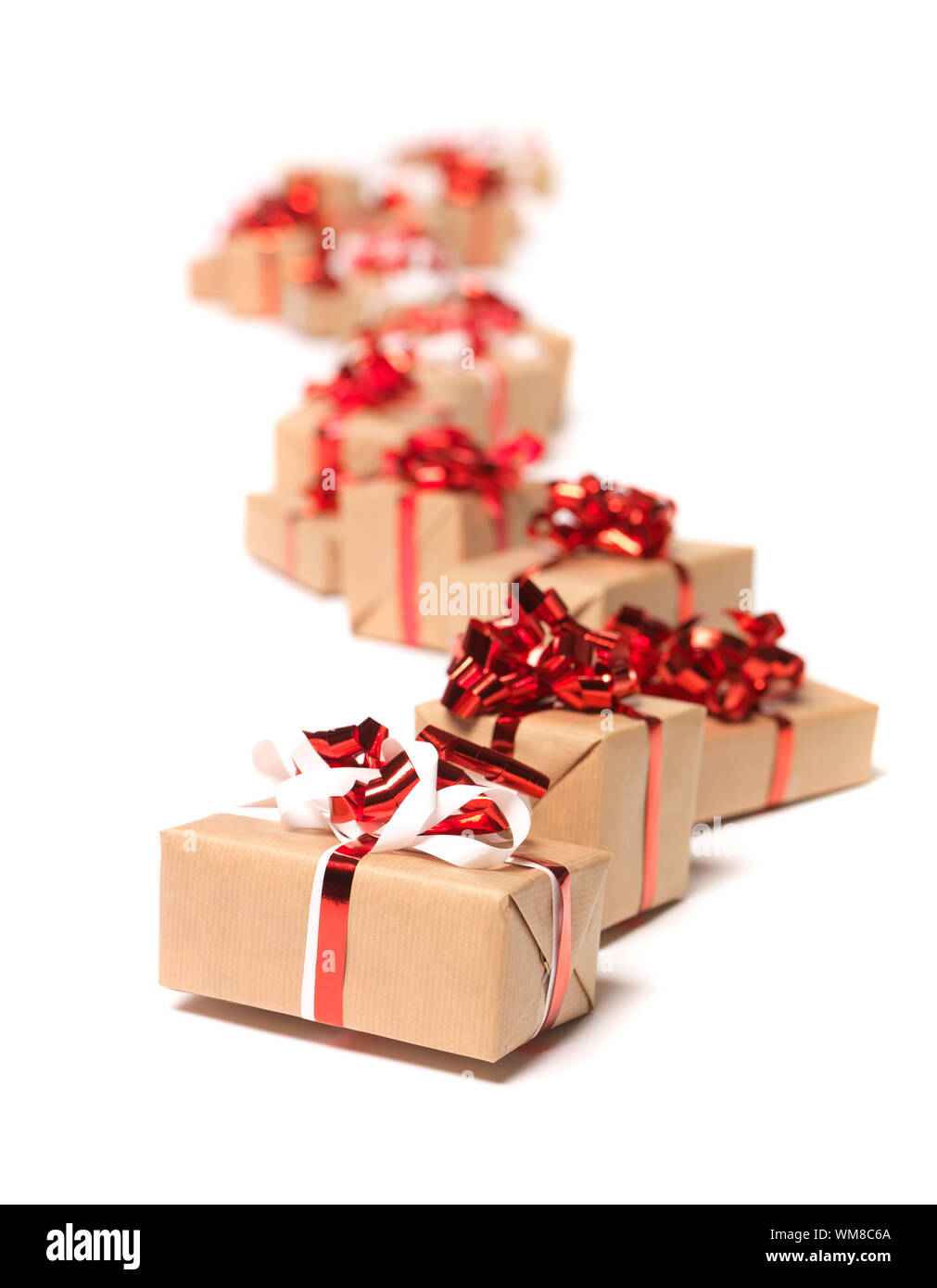 Christmas gifts in a row Stock Photo - Alamy
