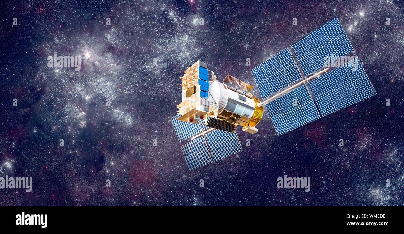 Space satellite orbiting the earth. Elements of this image furnished by ...