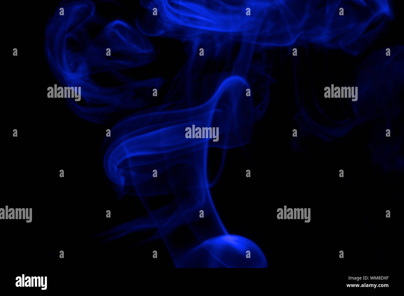 Abstract Blue Smoke Figures on Black background Stock Photo - Alamy