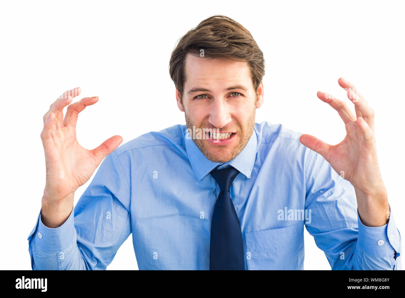 Annoyed businessman raising his hands on white background Stock Photo ...