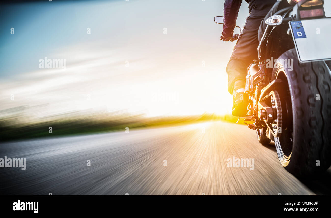Biker riding motorcycle low angle hi-res stock photography and images ...