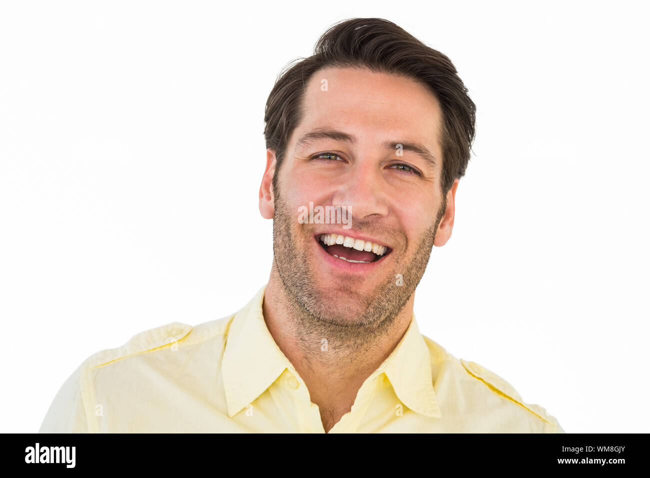 Smiling handsome man looking at camera on white background Stock Photo ...