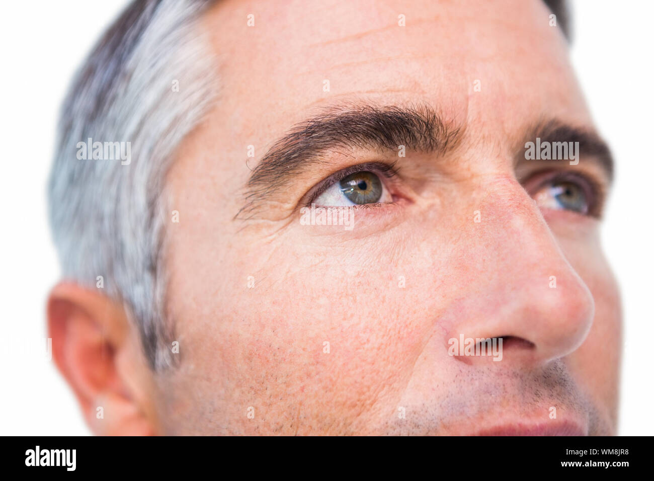 Close up of a man with grey hair on white background Stock Photo - Alamy