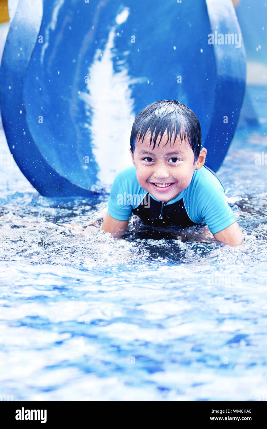 Water slide boy hi-res stock photography and images - Alamy