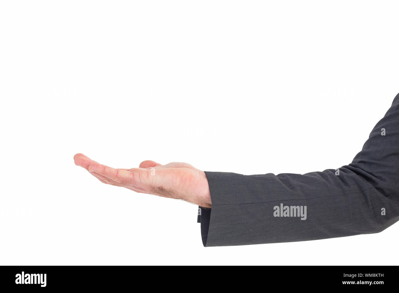 Businessman holding his hand out on white background Stock Photo - Alamy