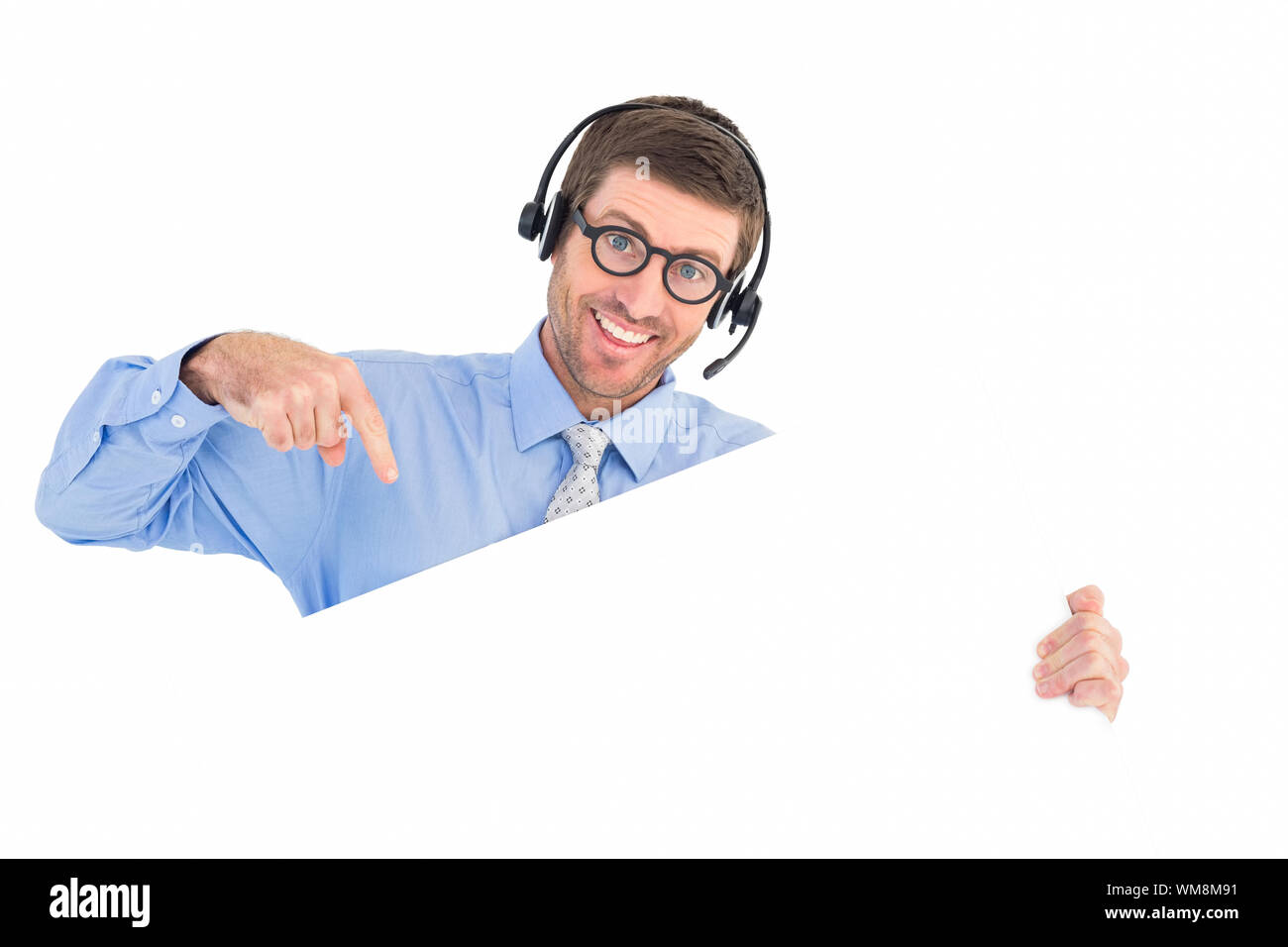 Businessman showing card wearing headset on white background Stock ...