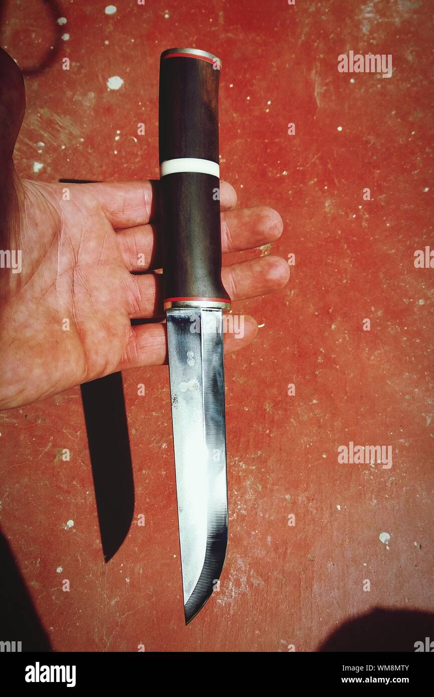 Person with knife shadow hi-res stock photography and images - Alamy
