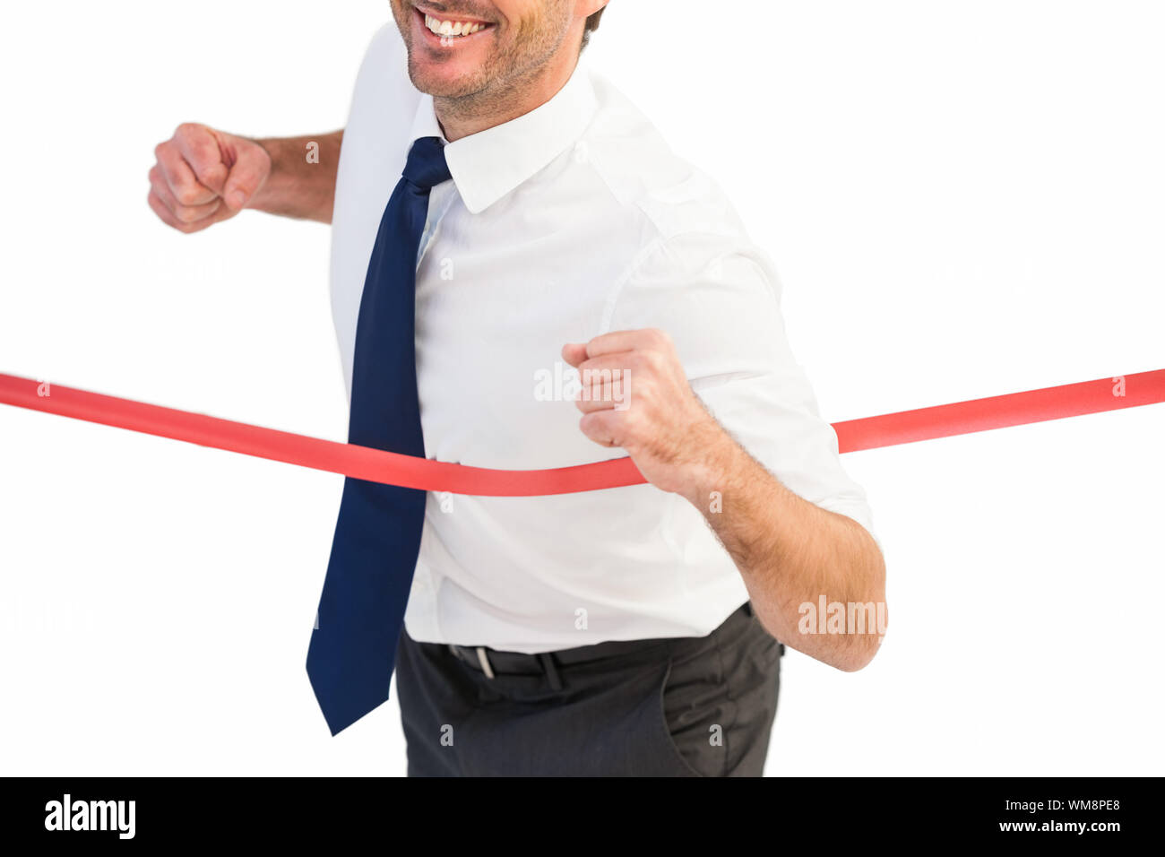 Businessman smiling and crossing the line on white background Stock ...