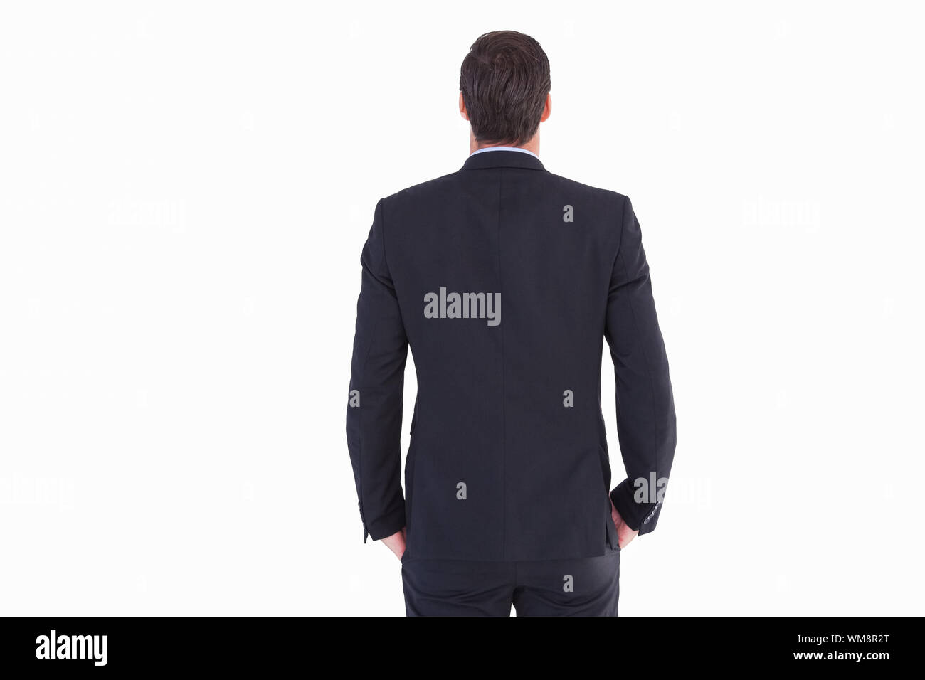 Rear view of handsome businessman on white background Stock Photo - Alamy