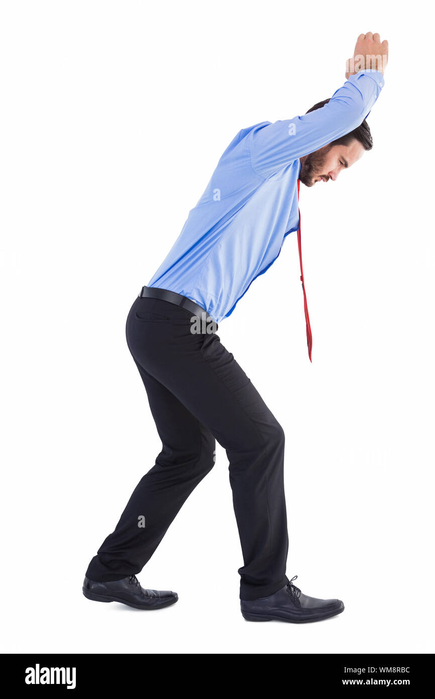 Bending businessman standing with hands raised on white background ...