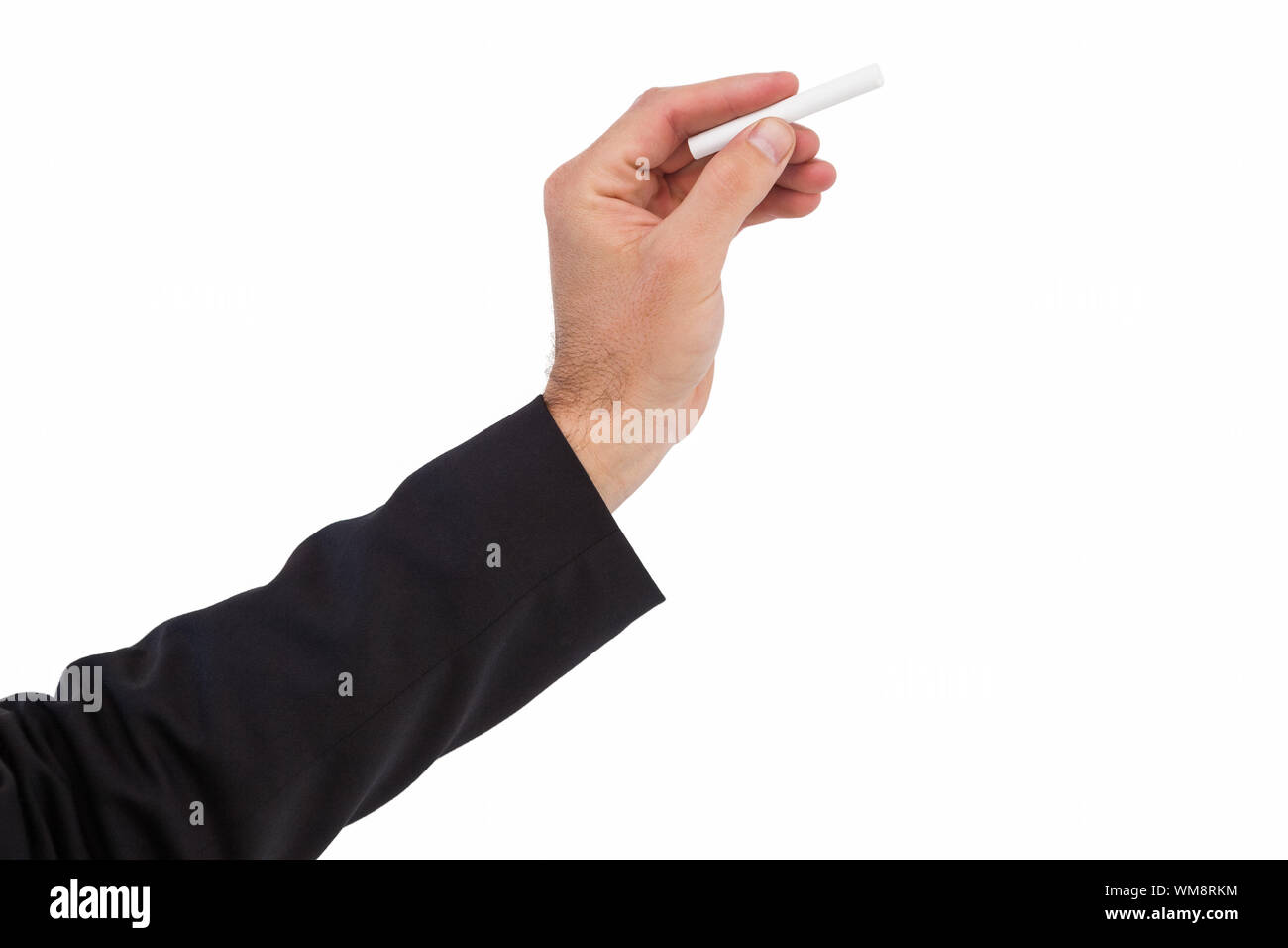 Hand holding a chalk and writing something on white background Stock ...