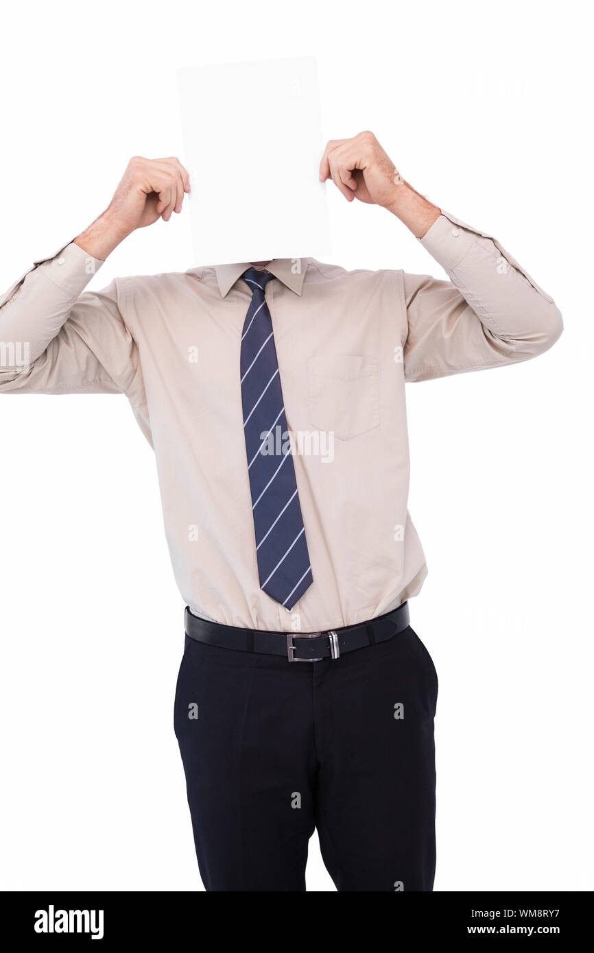 Businessman showing card in front of his head on white background Stock ...