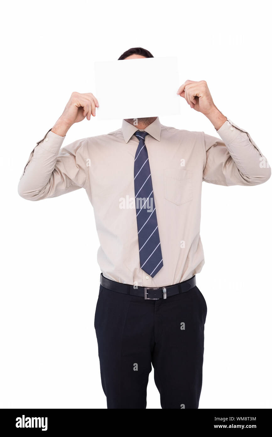 Businessman showing card in front of his head on white background Stock ...