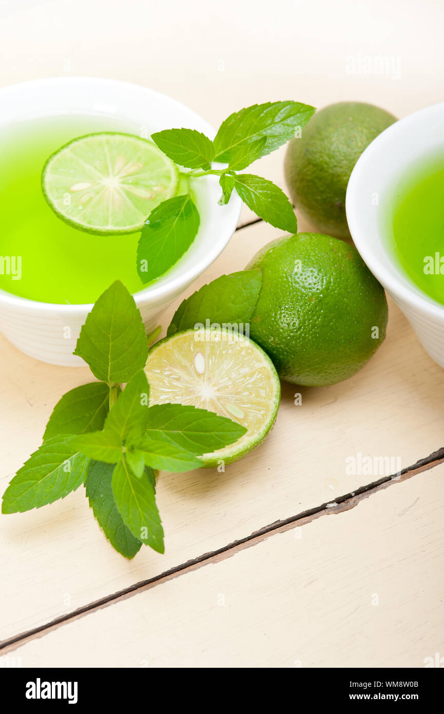 fresh and healthy mint infusion tea tisane with lime Stock Photo - Alamy
