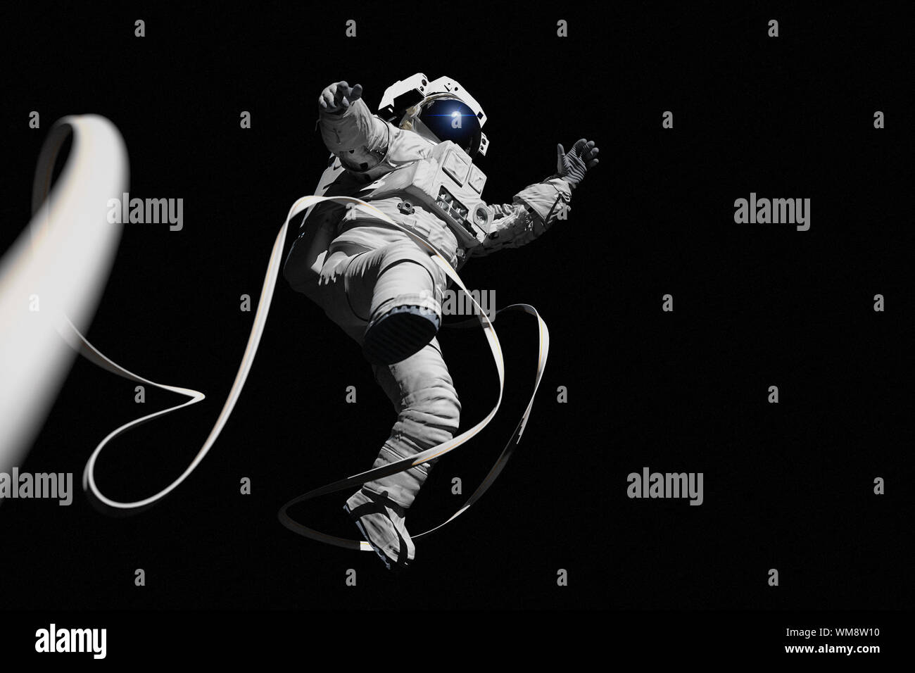 astronaut with safety tether performing a spacewalk, isolated on black ...