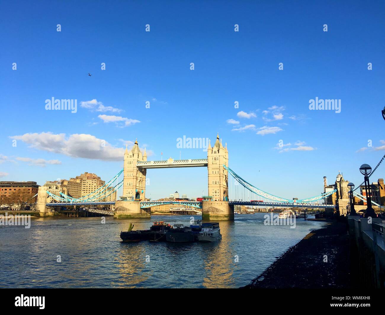 Suspension Bridge Over River Stock Photo - Alamy