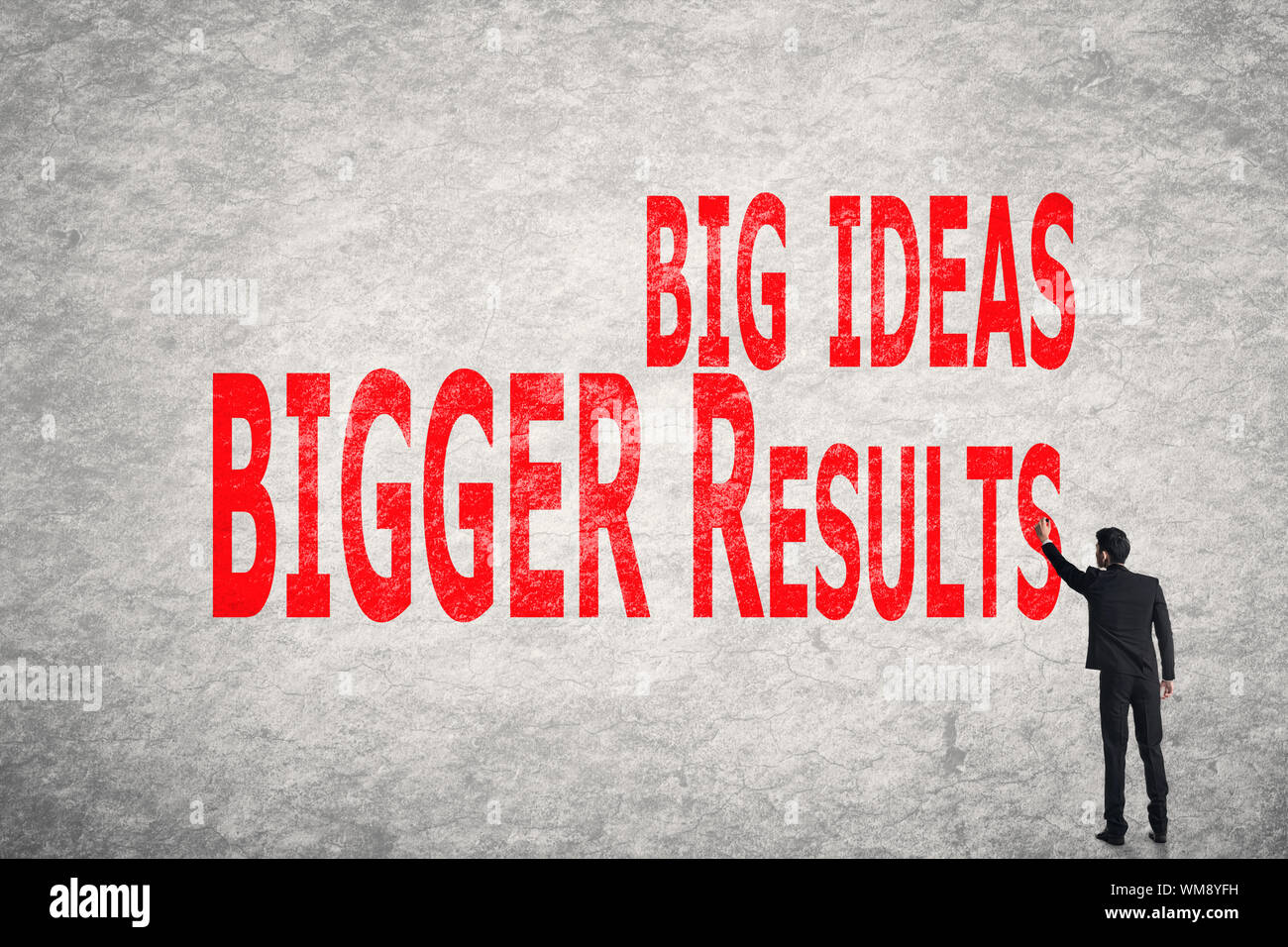Big ideas bigger results businessman hi-res stock photography and ...