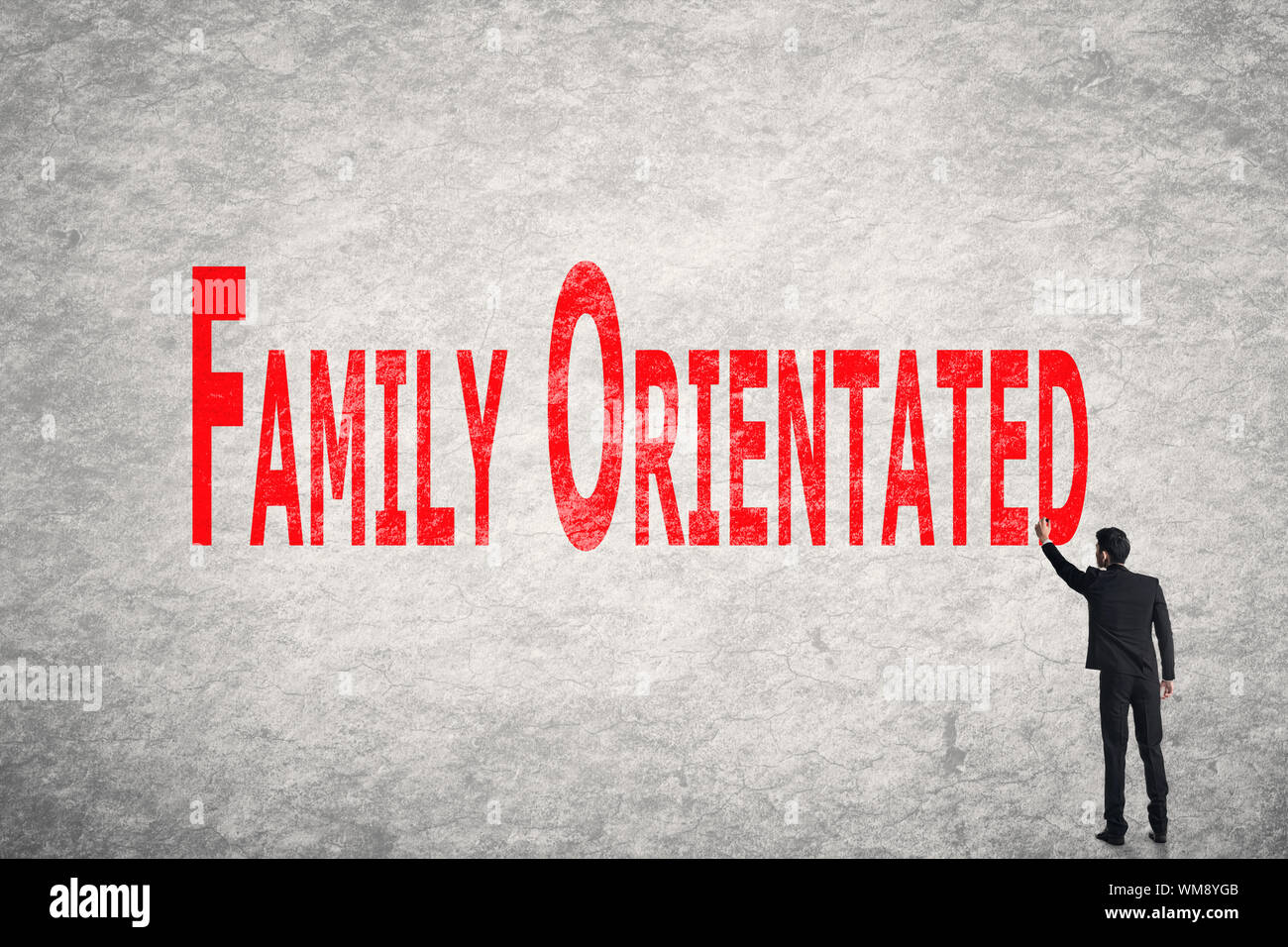 Asian business man write words on wall, Family Orientated Stock Photo ...