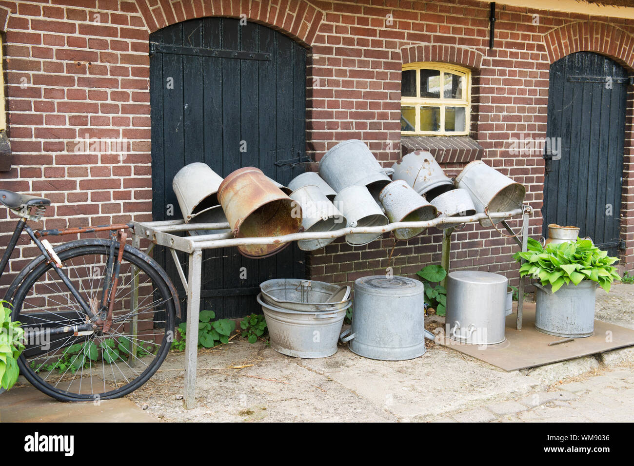 Vintage milk buckets at the old Dutch farm Stock Photo - Alamy