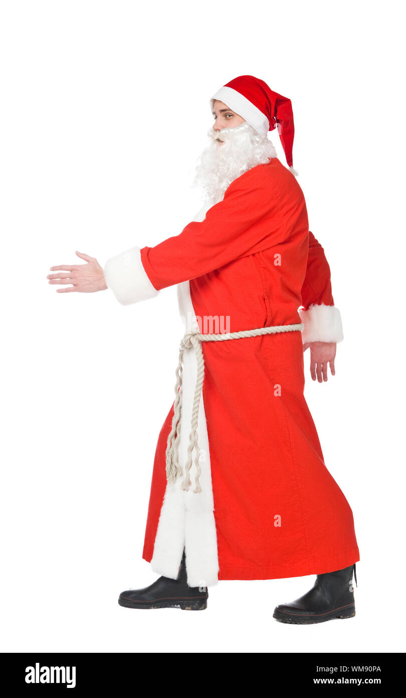 Santa Claus walking isolated on a white background Stock Photo - Alamy