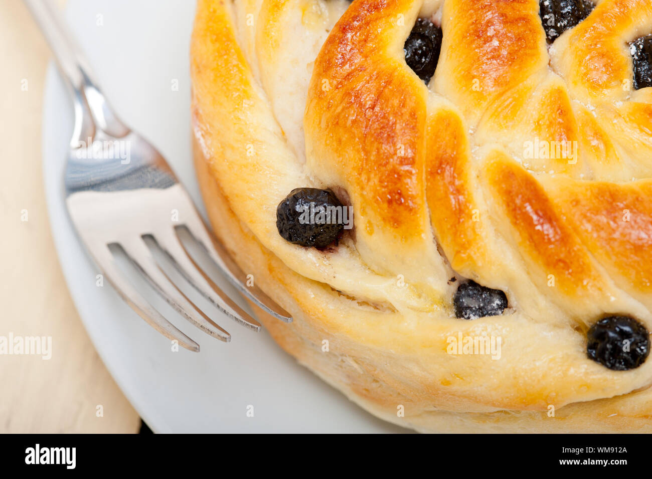 fresh home baked blueberry bread cake dessert over white wood table ...