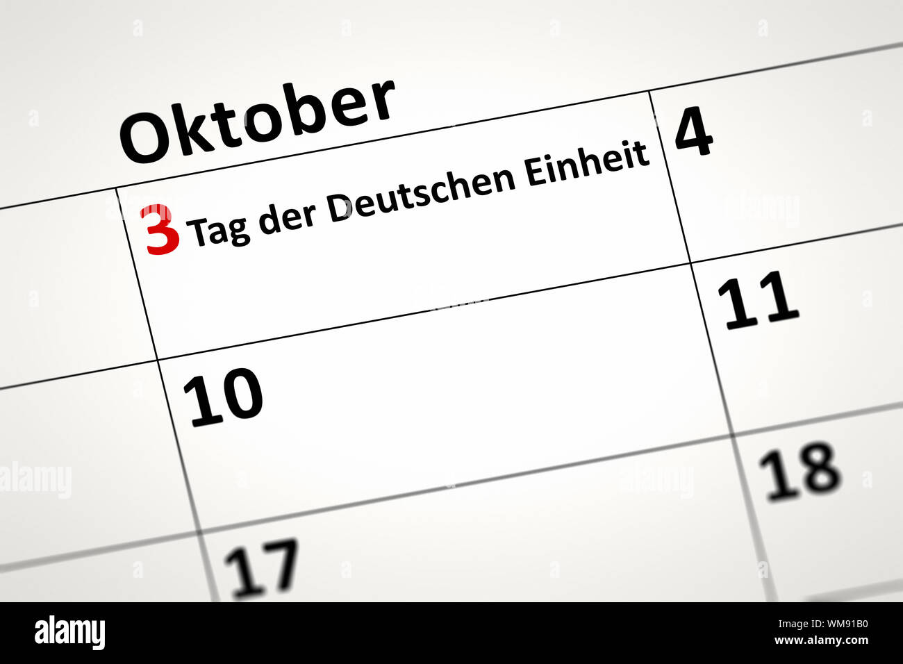 An image of a calendar detail shows october the 3rd Day of German Unity ...