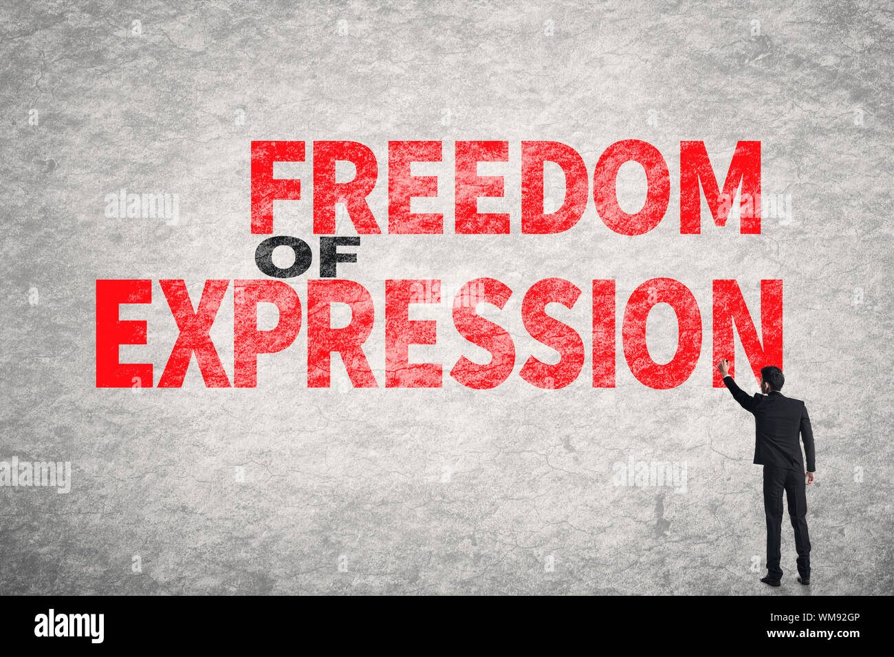 Asian businessman write text on wall, Freedom of Expression Stock Photo ...