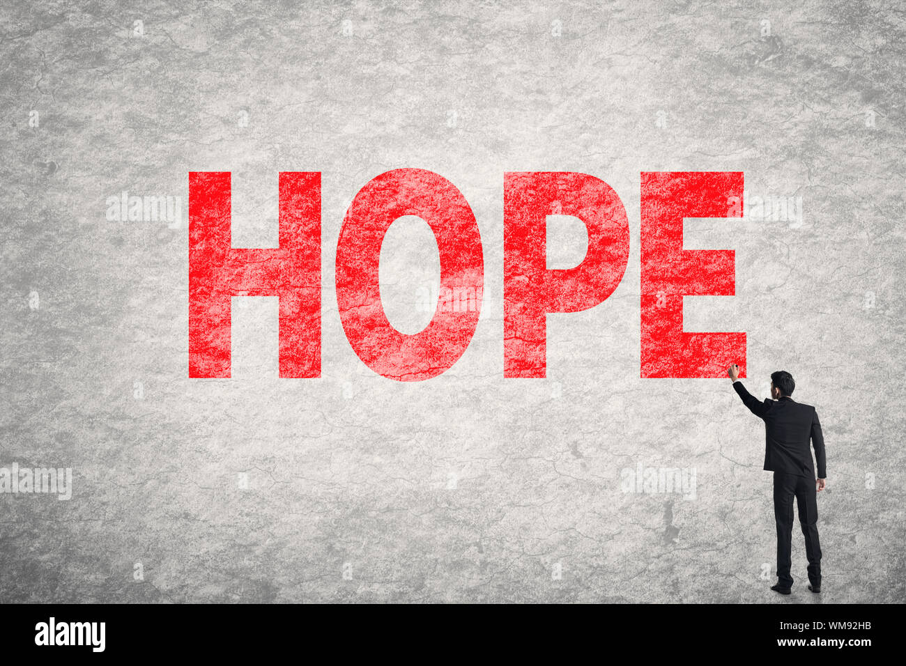 Asian businessman write text on wall, Hope Stock Photo - Alamy