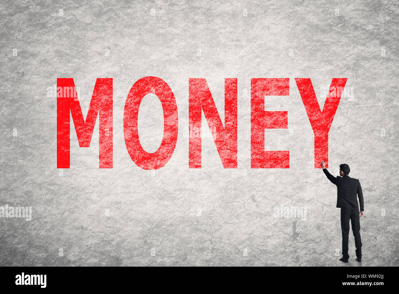 Asian businessman write text on wall, Money Stock Photo - Alamy