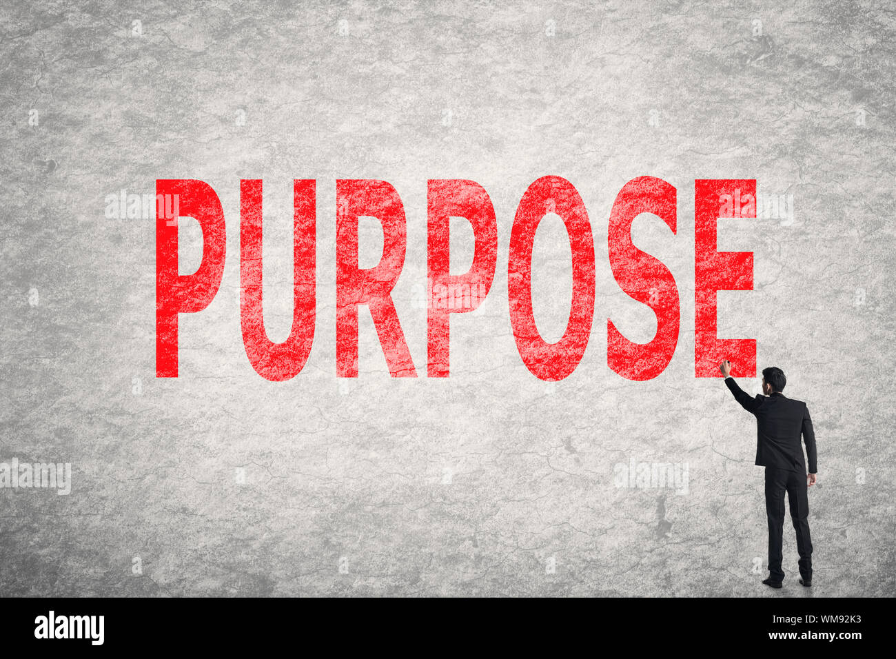 Asian businessman write text on wall, Purpose Stock Photo - Alamy