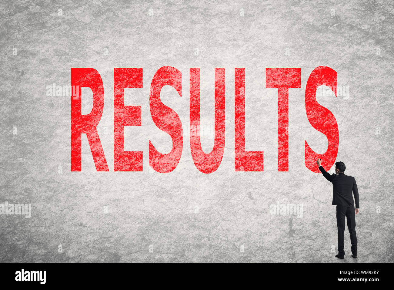 Asian businessman write text on wall, Results Stock Photo - Alamy