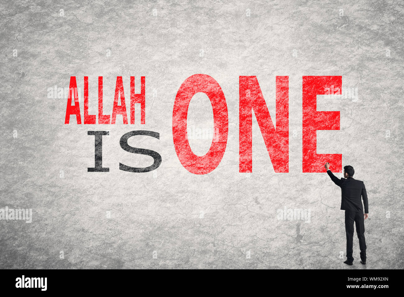 Asian businessman write text on wall, Allah is One Stock Photo - Alamy